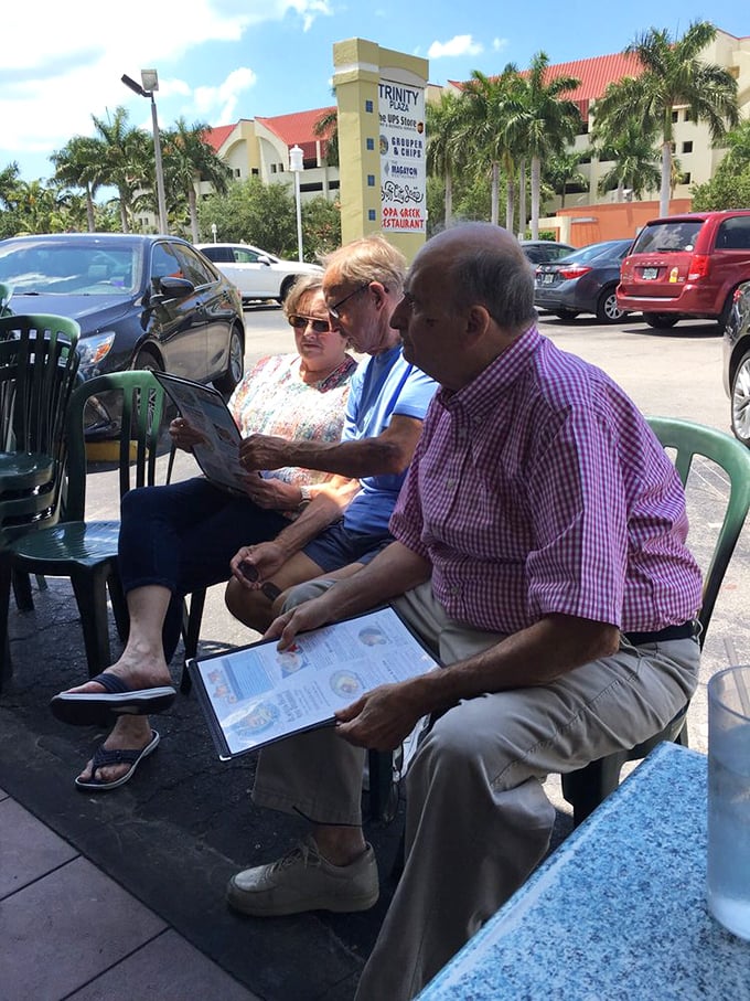 The outdoor seating area—where locals and tourists unite in the universal language of "Did you try the grouper sandwich yet?"