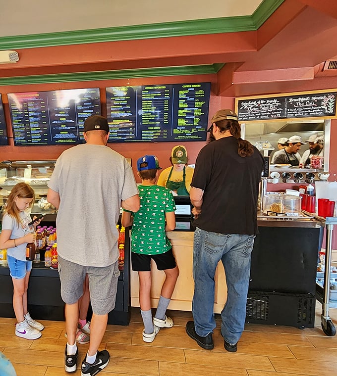 The universal language of anticipation—families waiting for cheese-laden delights while contemplating life's most important question: "Curds or sandwich first?"