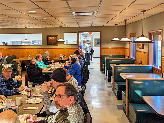 The morning crowd knows the secret—breakfast tastes better when surrounded by neighbors who've been coming here since before you were born.
