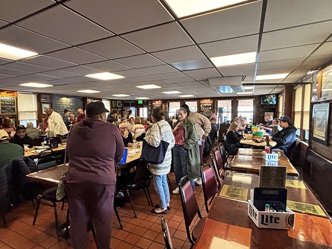 The weekend crowd at Cantler's represents a cross-section of Maryland life – all united in pursuit of perfectly steamed crustaceans.