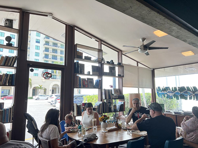 Community happens naturally here—tables filled with conversations, connections, and the shared language of good food in sunlit surroundings.