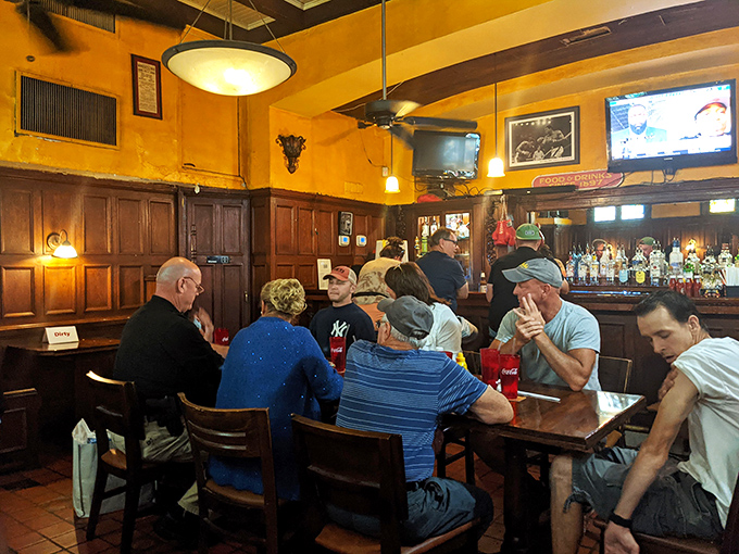 Where strangers become friends over great food. The bar area hums with conversation—proof that breaking bread together still brings people together.