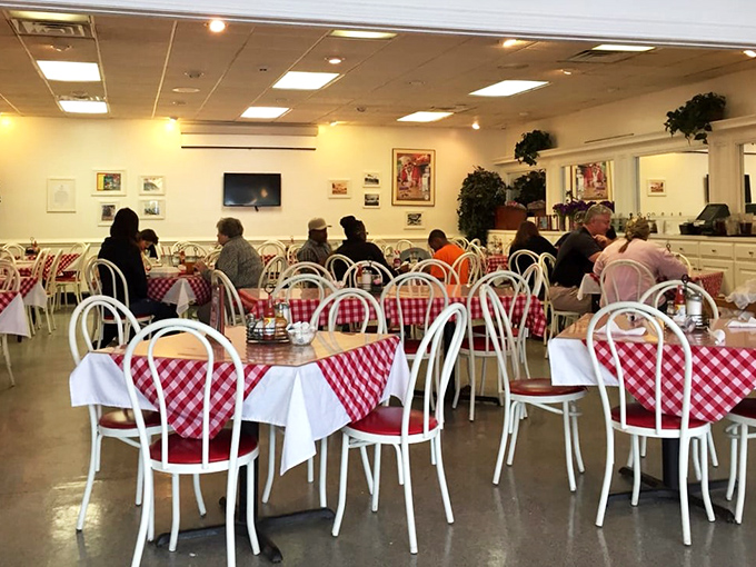 Classic red and white checkered tablecloths—the universal signal that good, unpretentious food is coming your way. No tweezers were used in this kitchen!