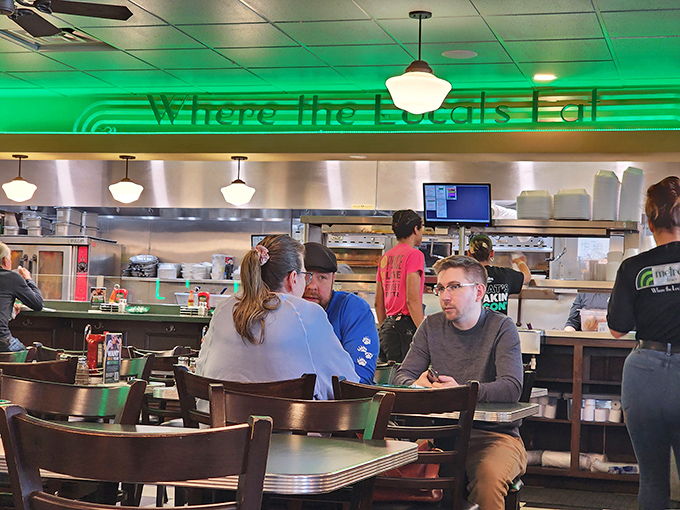"Where the locals eat" isn't just a slogan – it's the truth. The counter seating offers front-row tickets to the culinary show.