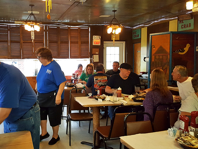 Where strangers become friends over shared love of seafood. Notice the complete absence of phones – everyone's too busy enjoying their meal.