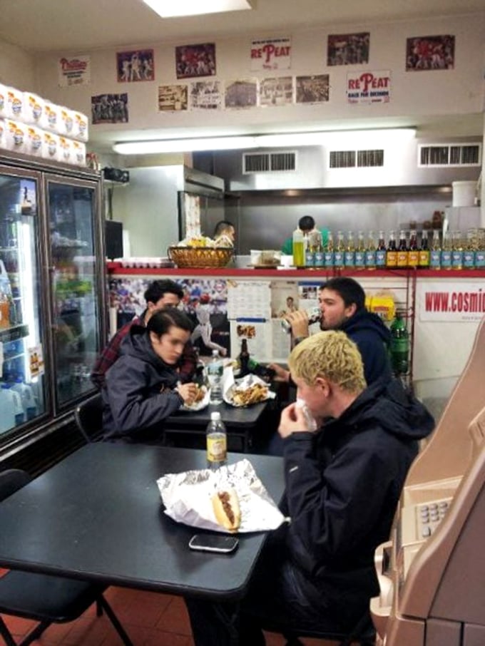Real people enjoying real food. No influencer poses here—just the genuine happiness that comes from biting into something truly special.