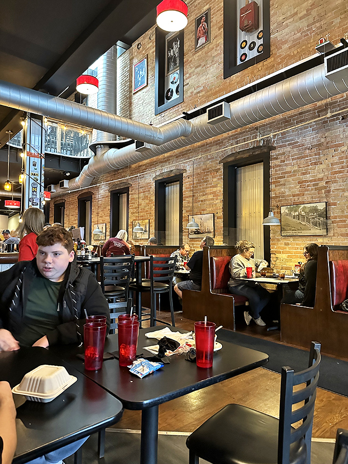 The dining room buzzes with the universal language of satisfaction—forks pausing mid-air as conversations flow between bites.