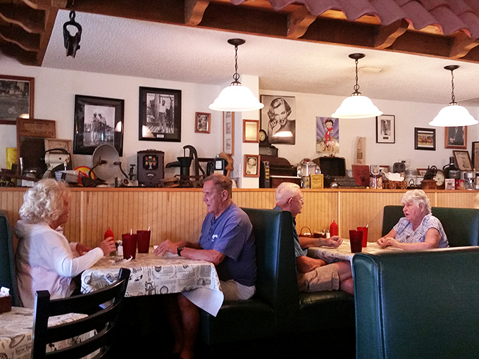 The best endorsement any restaurant can have – happy regulars deep in conversation, iced tea in hand, comfortable in their favorite dining spot.