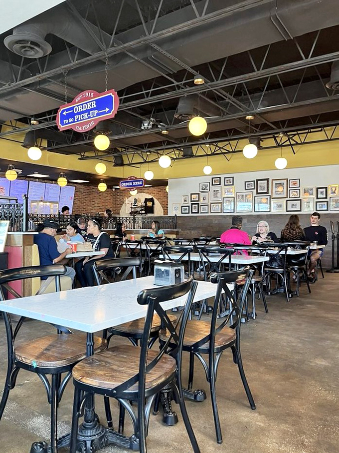 The dining area hums with the satisfied murmurs of patrons experiencing bread epiphanies. Those vintage photos on the wall? Silent witnesses to decades of deliciousness.