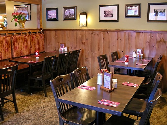 Cozy corners and wooden charm. The dining area feels like you've been invited to a friend's mountain cabin—if your friend were a culinary genius.