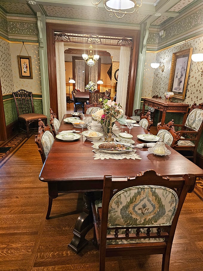 The dining room showcases elegant Victorian style, where normal architectural rules apparently took permanent vacation.
