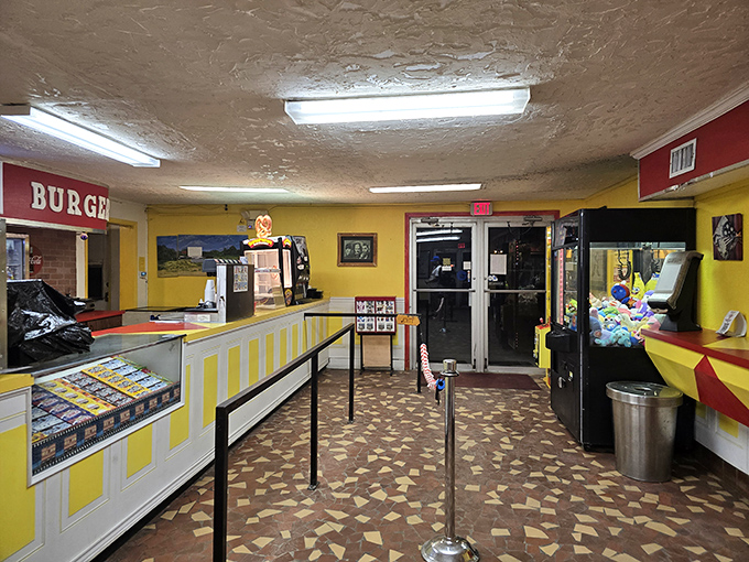 This yellow and red concession area isn't just selling food—it's selling the complete American movie experience, one perfectly salted batch of popcorn at a time.