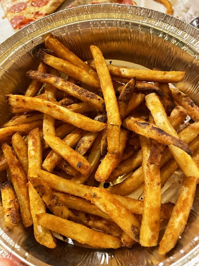 These aren't just fries – they're golden wands of potato perfection. Crispy, seasoned, and ready to disappear faster than you can say "just one more."