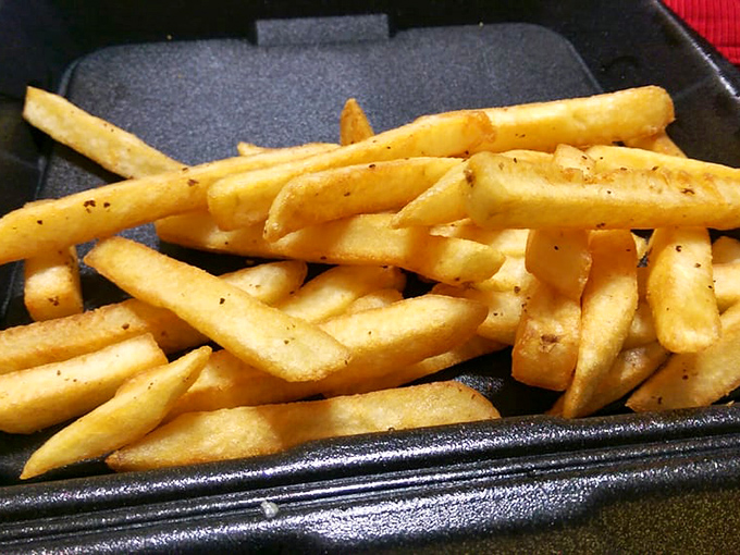 These aren't just fries—they're supporting actors that deserve their own award, perfectly crisp and seasoned to complement the Mediterranean stars.