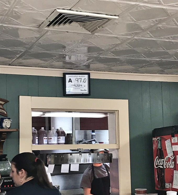 That "A" sanitation rating proudly displayed says what locals already know—this place takes its barbecue seriously, right down to the spotless kitchen.