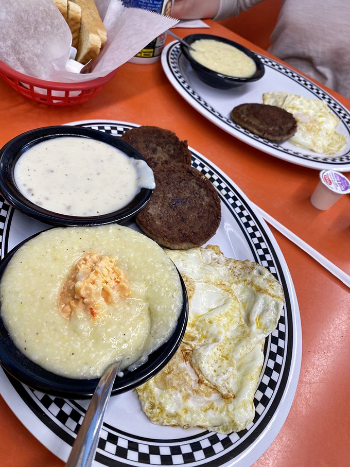 Creamy grits crowned with perfectly seasoned sausage - Southern comfort food at its absolute finest.