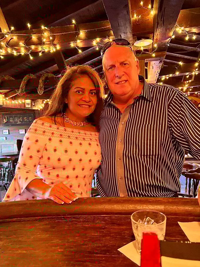 The warm glow of string lights creates the perfect backdrop for celebrations, turning first-time visitors into regulars and strangers into friends.