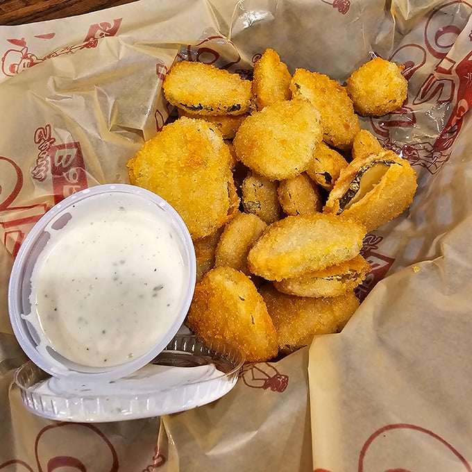 Fried pickles: the unexpected hero of bar snacks. Crunchy exterior, tangy interior—it's a texture party your mouth is definitely invited to.