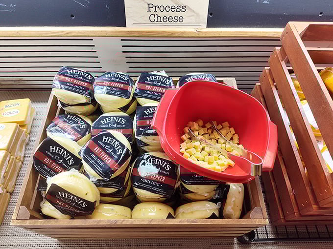 The sample station—where life-changing decisions happen one toothpick at a time. That little red scoop has witnessed countless "Aha!" moments in cheese discovery.