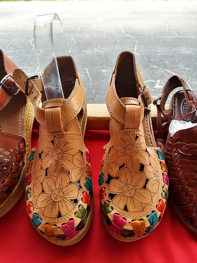 Dancing flowers on leather! These handcrafted huaraches blend comfort with artistry—footwear that makes even the most mundane errands feel like a fiesta.