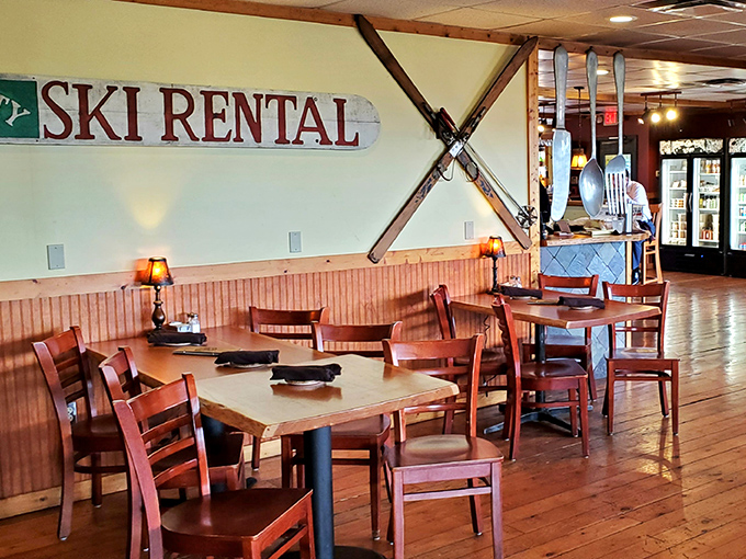The "ski rental" sign and crossed skis aren't just decoration—they're conversation starters in a space where lingering over coffee feels not just allowed but encouraged.