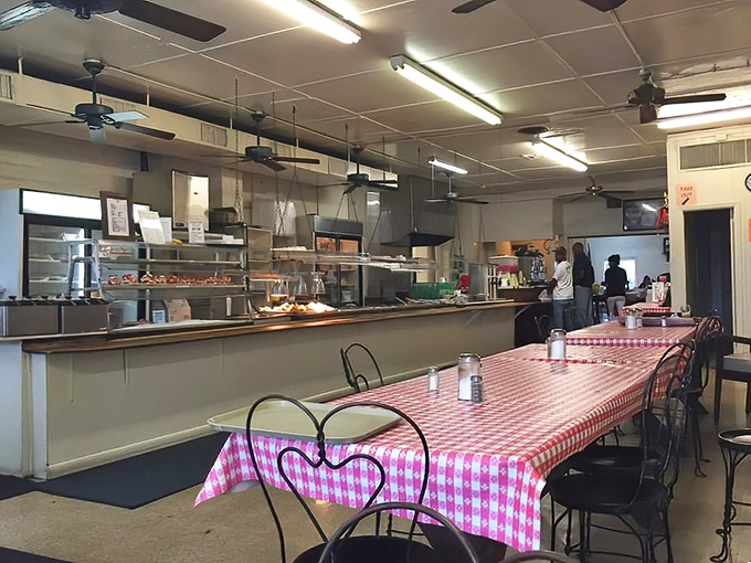 No-frills fluorescent lighting illuminates what matters most: tables where memories are made and second helpings are encouraged.