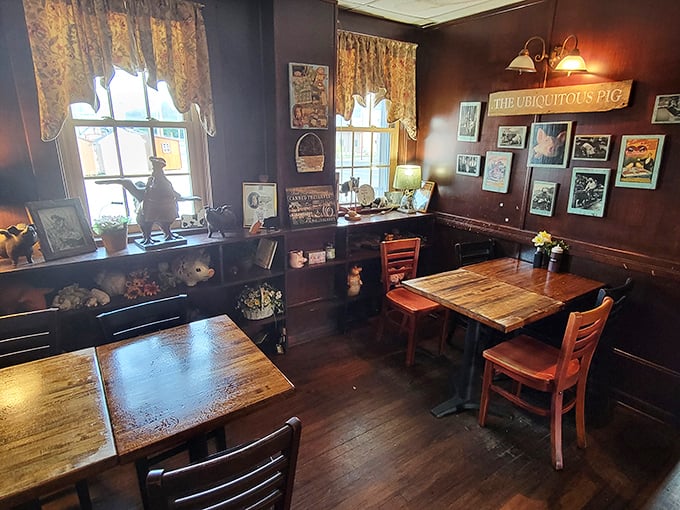 The dining room feels like a barbecue historian's cozy den, with wooden tables ready for serious eating and walls that tell smoky stories.