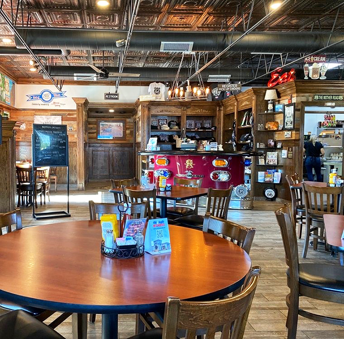 Wood paneling, round tables, and memorabilia—not decorated so much as curated by someone who understands the difference between kitsch and character.