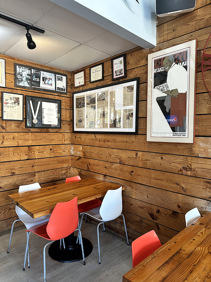 Wooden walls and colorful chairs create that rare space where both hipsters and their parents feel equally at home.