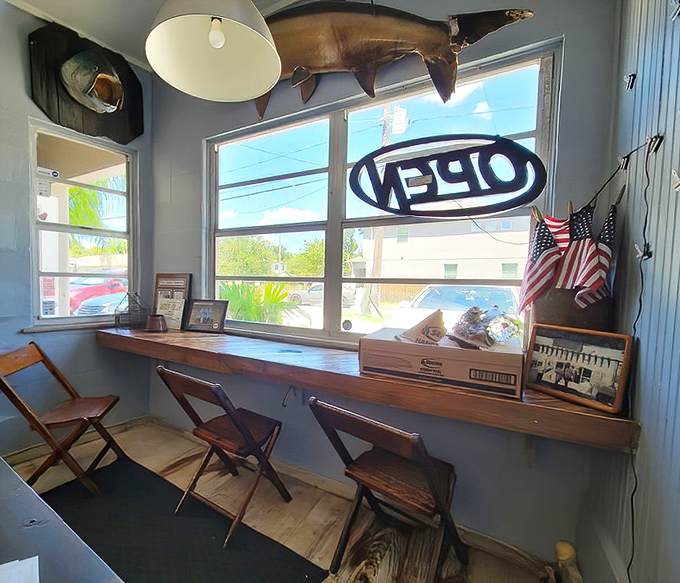 That counter window view is like watching a delicious theatrical performance where fresh Gulf catches play the starring roles.