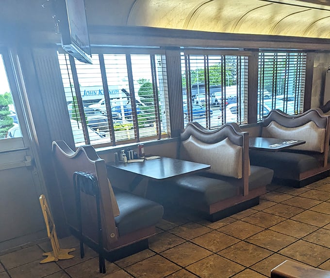 Classic booth seating with a view – where countless first dates, family celebrations, and post-game analyses have unfolded since before smartphones ruled the world.