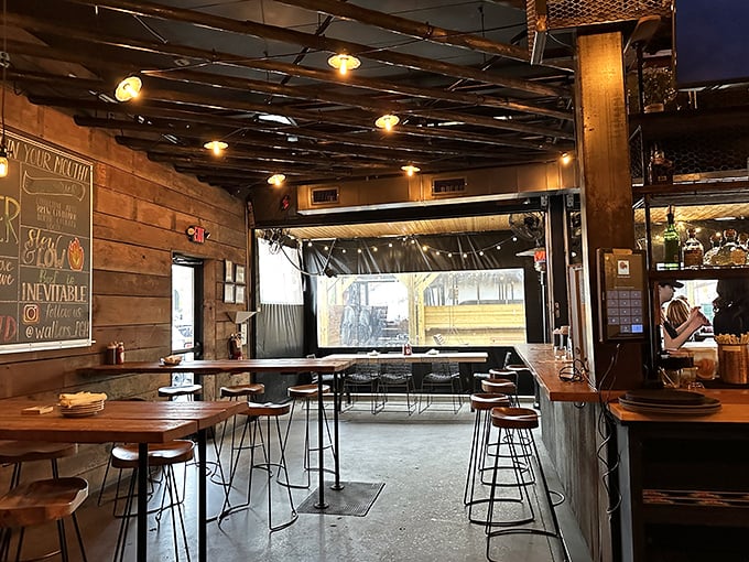 Wooden walls, industrial lighting, and bar seating that invites you to settle in. This isn't just a meal – it's an afternoon well spent.
