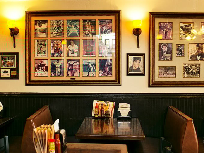 Wall-to-wall memories in frames tell stories of famous visitors, while the booths below create new stories every day.