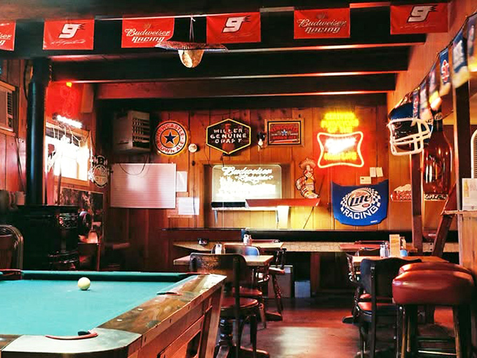 Wood paneling and warm lighting create the kind of ambiance money can't buy. Like dining in your coolest uncle's cabin—if he were a steak wizard.