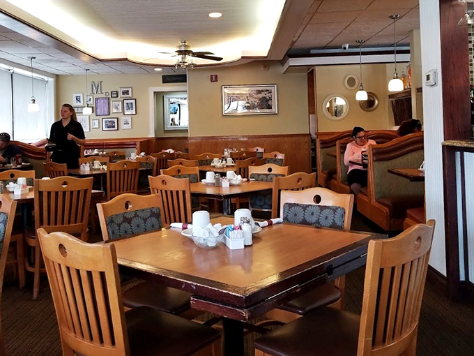 The dining room balances cozy and spacious, like your favorite aunt's house—if your aunt were an exceptional cook with seating for fifty.