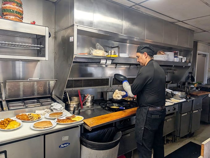 Where the magic happens—a kitchen view that reveals the choreographed dance of short-order cooking at its finest.