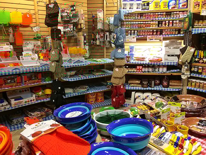 Kitchen gadgets stack floor-to-ceiling in chromatic chaos—somehow containing every culinary tool you never knew you desperately needed.