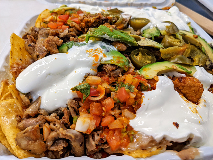 Nachos that laugh in the face of movie theater versions – every chip gets its fair share of toppings in this democratic distribution of deliciousness.