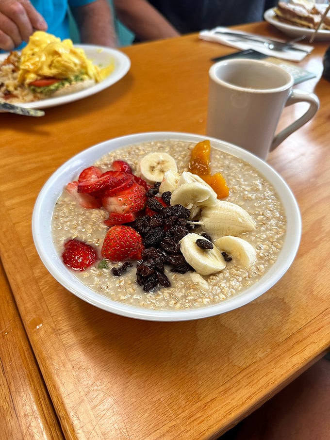 Oatmeal that's actually exciting—a phrase I never thought I'd write. Topped with fresh fruit and served with coffee, it's the breakfast equivalent of a warm hug.