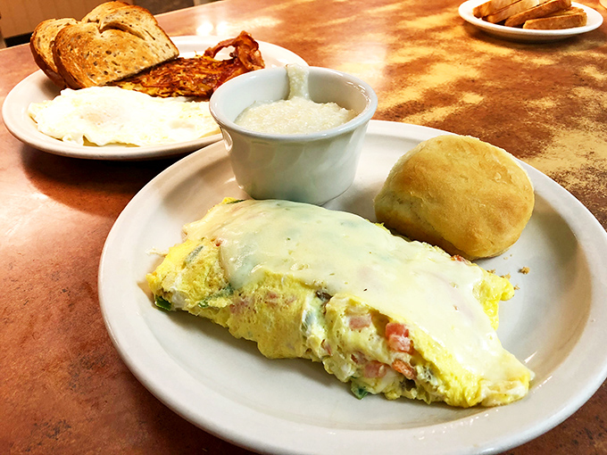 An omelet that's having an identity crisis with gravy—and we're all better for this delicious confusion of breakfast boundaries.