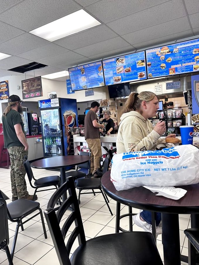 The lunch rush at Bro Man's—where strangers become friends united by the universal language of "Oh my god, you have to try this."