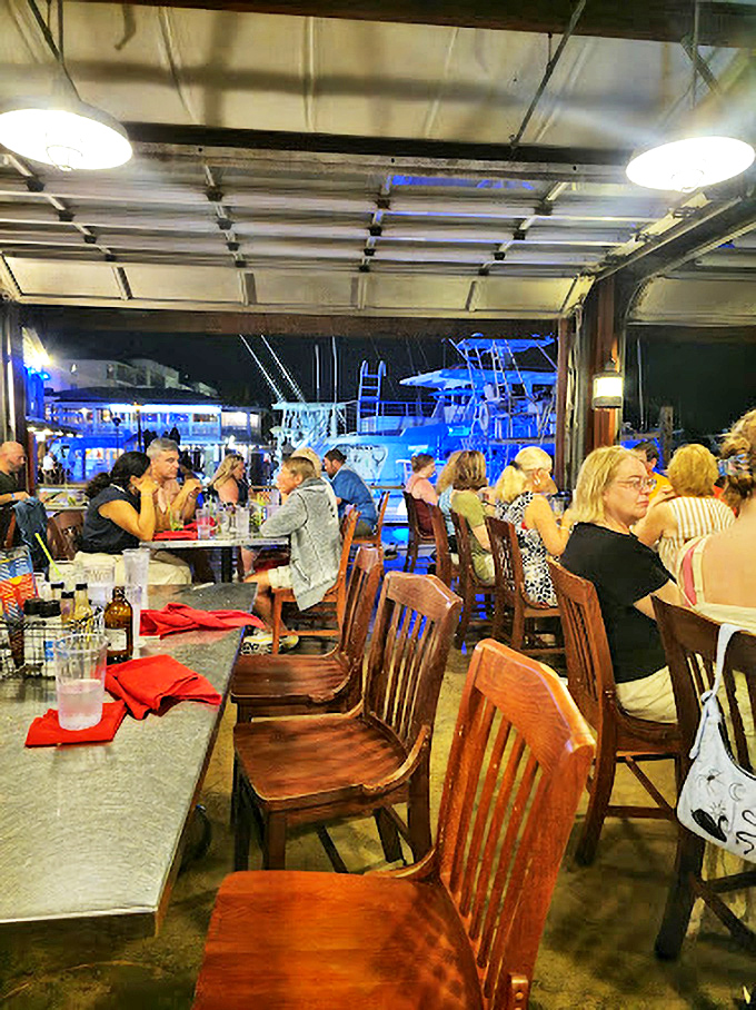 Dinner with a view—fishing boats twinkling in the harbor make every bite taste somehow more authentically "Keys."
