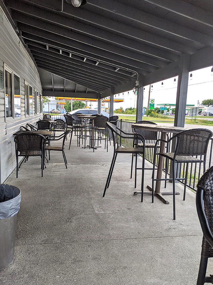 The covered patio offers al fresco dining with high-top tables—perfect for summer evenings when eating indoors feels like a crime.