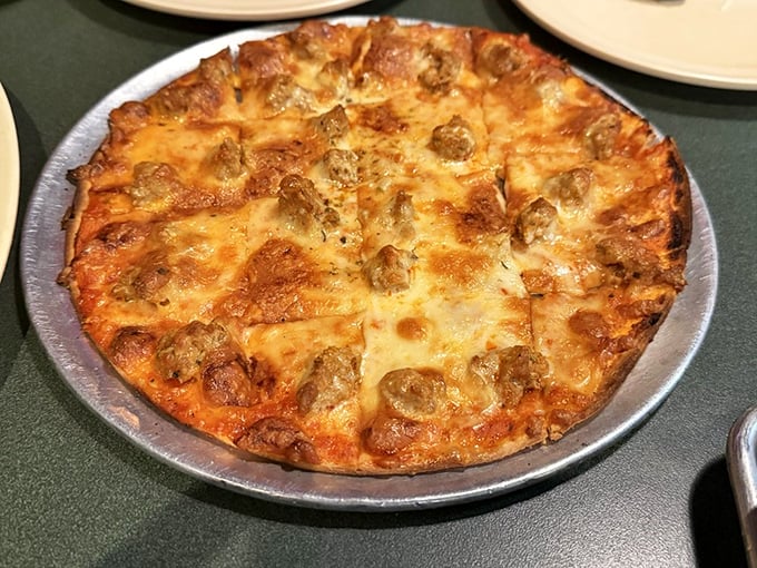 This pizza isn't trying to be Italian—it's proudly St. Louis style with its thin crust and melty Provel cheese. Midwestern magic on a pan.