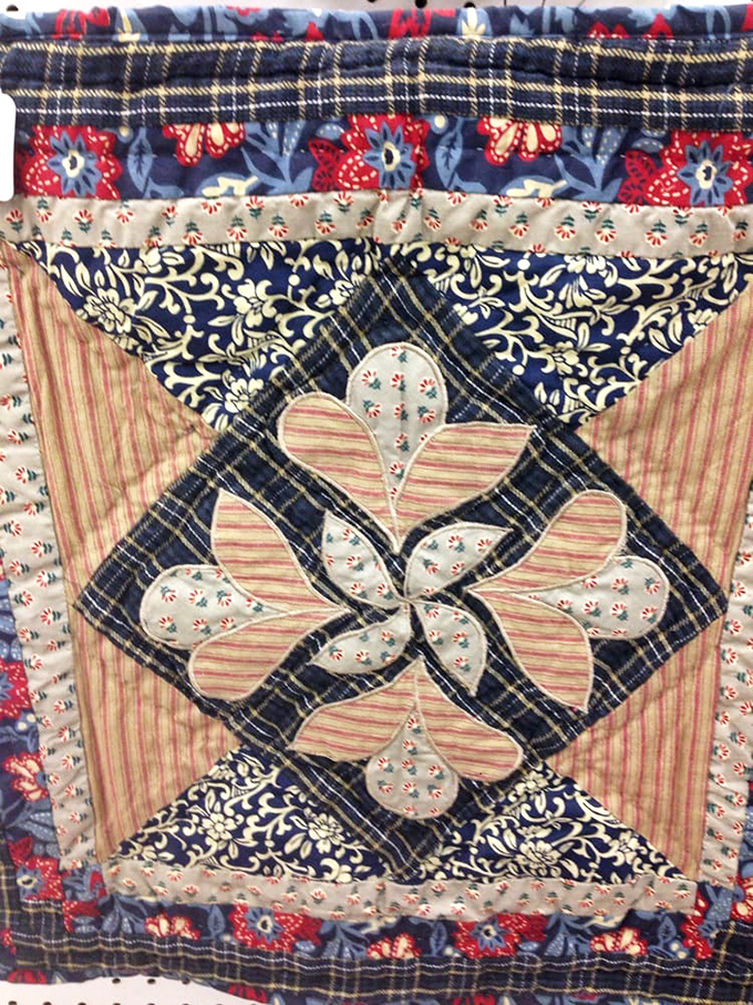 Handstitched history in fabric form—this quilt represents countless hours of patience and precision that our smartphone-addicted fingers can barely comprehend.