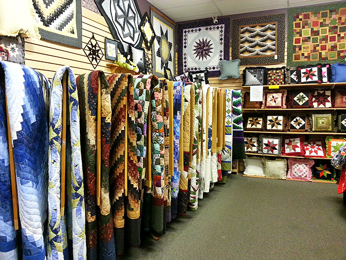 Quilts that warm both body and soul line this corner of craftsmanship. Each stitch represents hours of dedication to an art form that refuses to be forgotten.