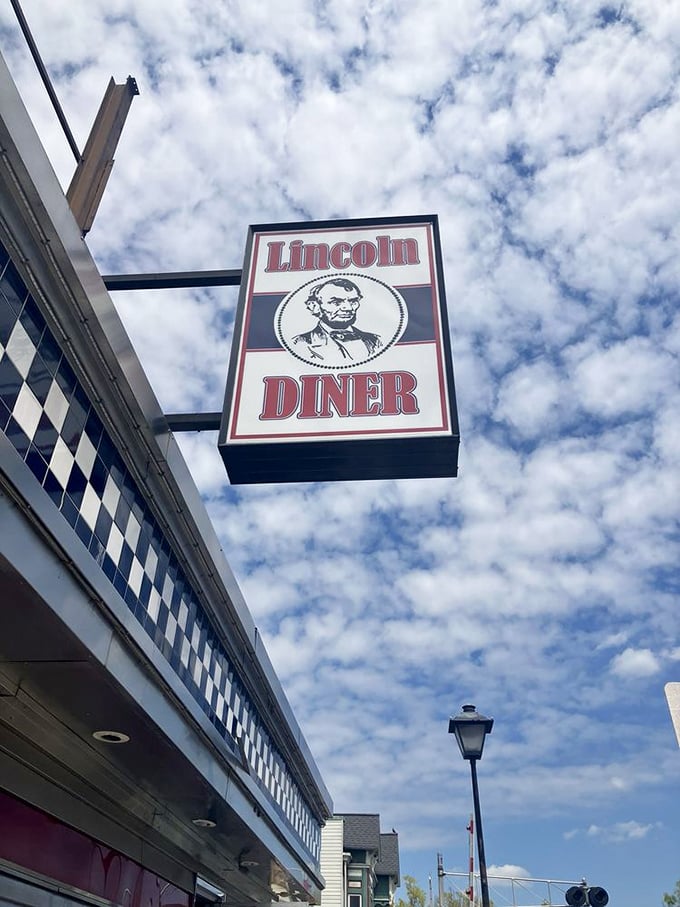 The iconic Lincoln Diner sign against Pennsylvania's blue sky—a beacon of hope for the hungry traveler seeking comfort food salvation.