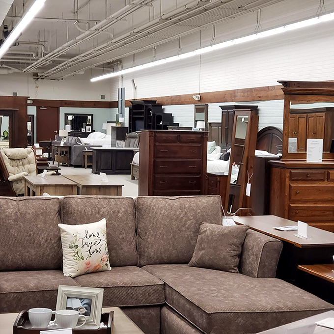Modern comfort meets timeless craftsmanship in the furniture section. That "Home Sweet Home" pillow isn't just decor—it's foreshadowing your credit card bill.