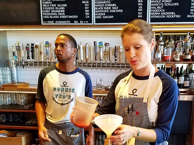 The staff moves with the choreographed precision of people who know their seafood isn't just food—it's an experience worth getting right.