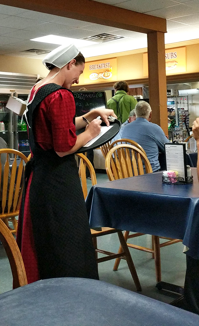 Traditional Amish attire isn't a costume here—it's authentic culture served alongside authentic food. This is hospitality with heritage woven into every detail.